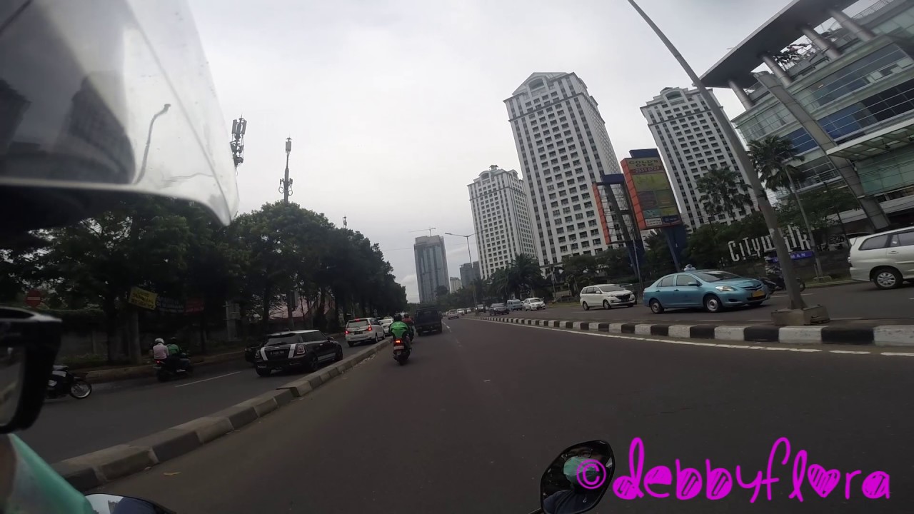 Riding a fly-over in Jakarta and enjoying the amazing view of the city ...