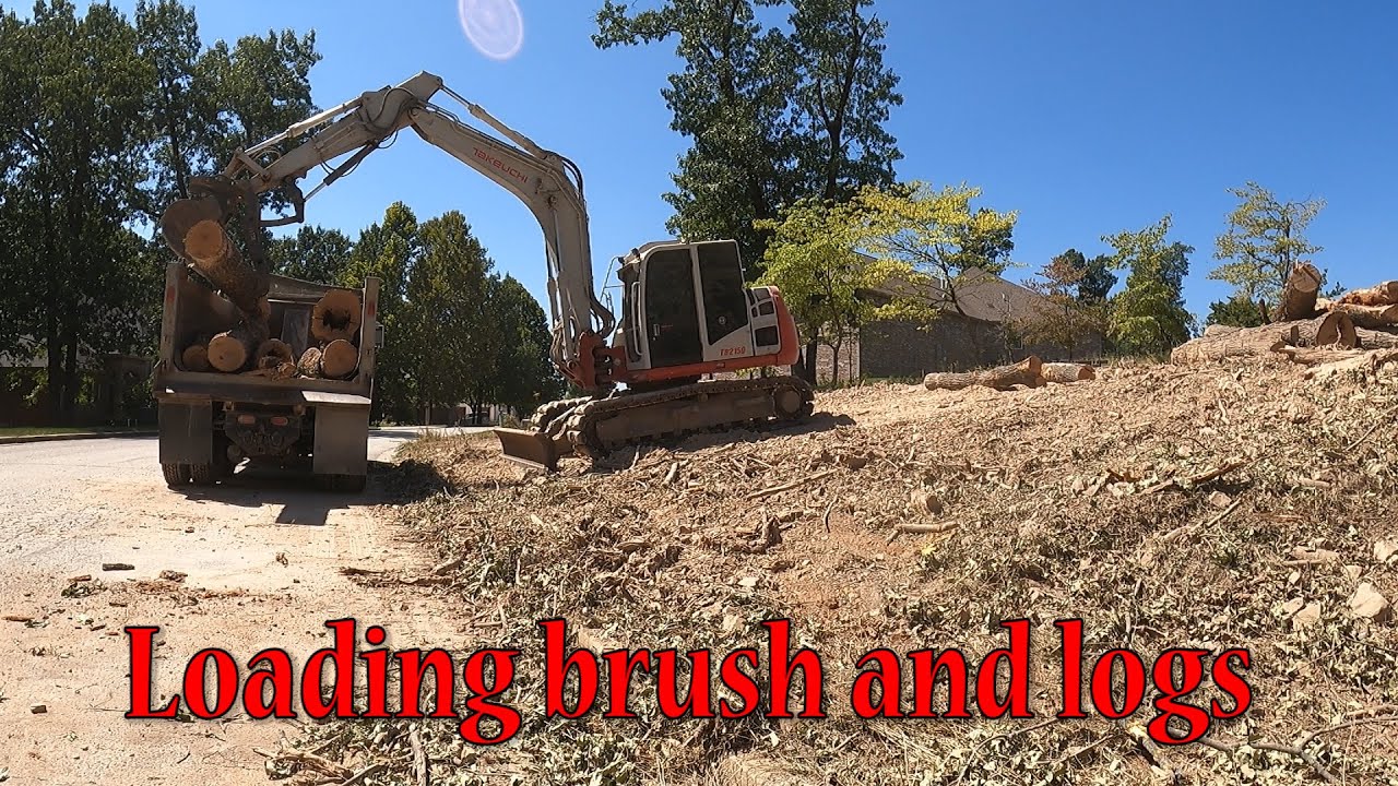 Loading The Brush And Logs On The Clearing Job - YouTube