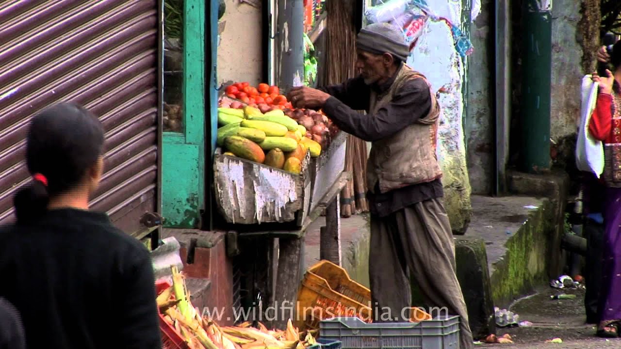 Old shopkeeper displaying veggies in Landour bazaar - YouTube