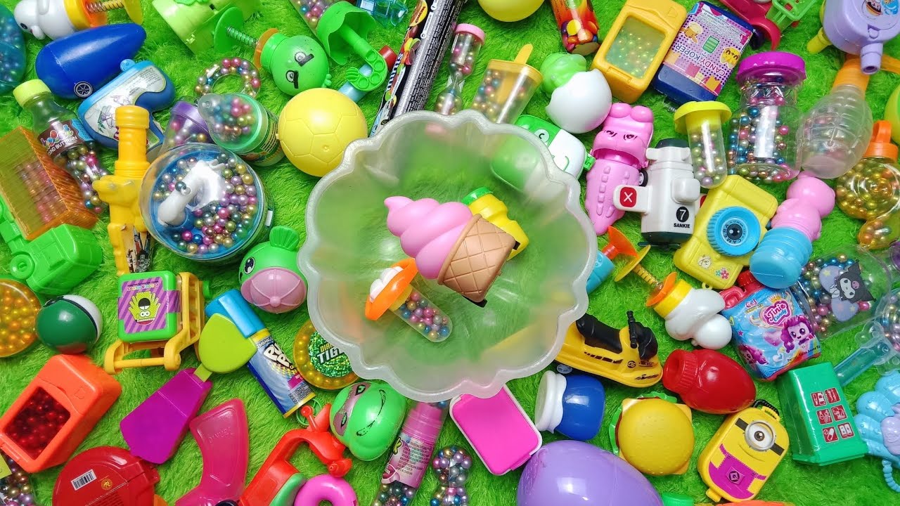 Asmr video shares the characters of plastic candy container ice, emoji ...