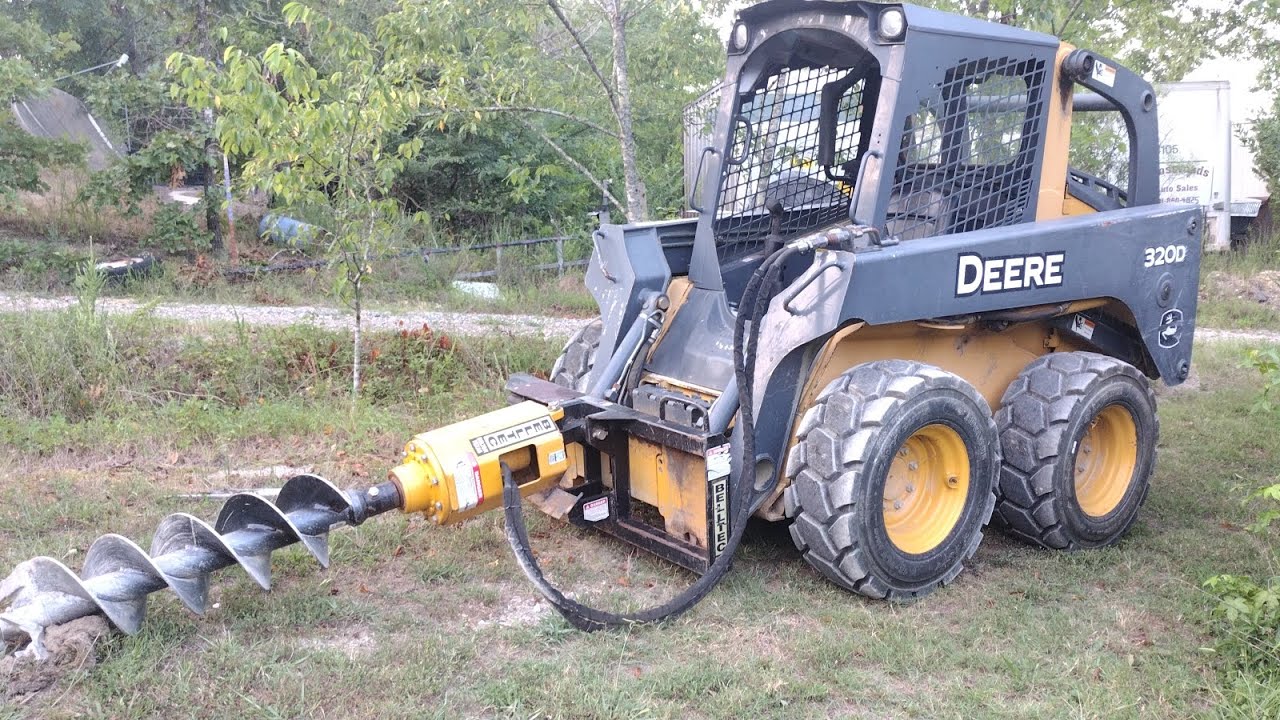 Drilling Hole in Arkansas Shale for electric pole john deere 320D ...
