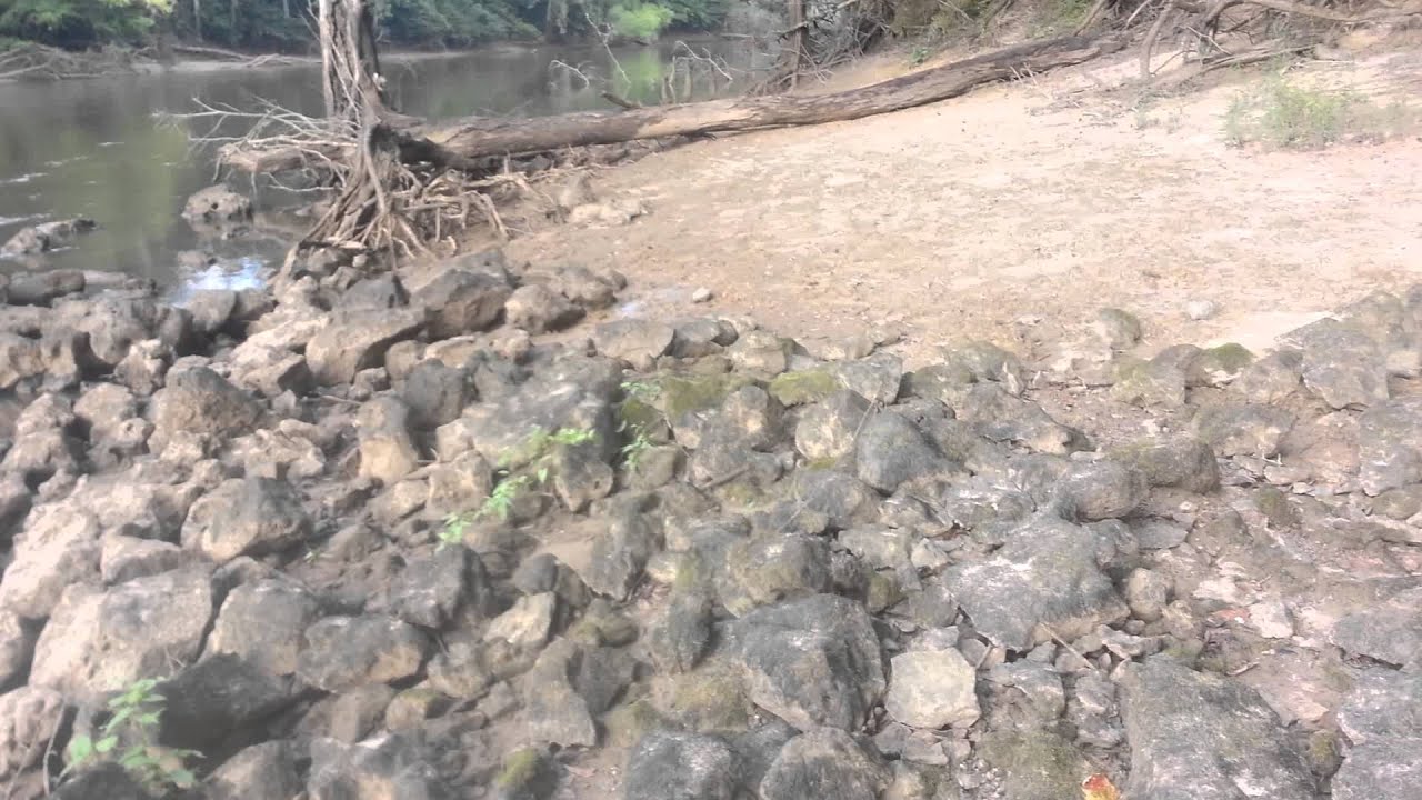 Rock quarry on the river - YouTube