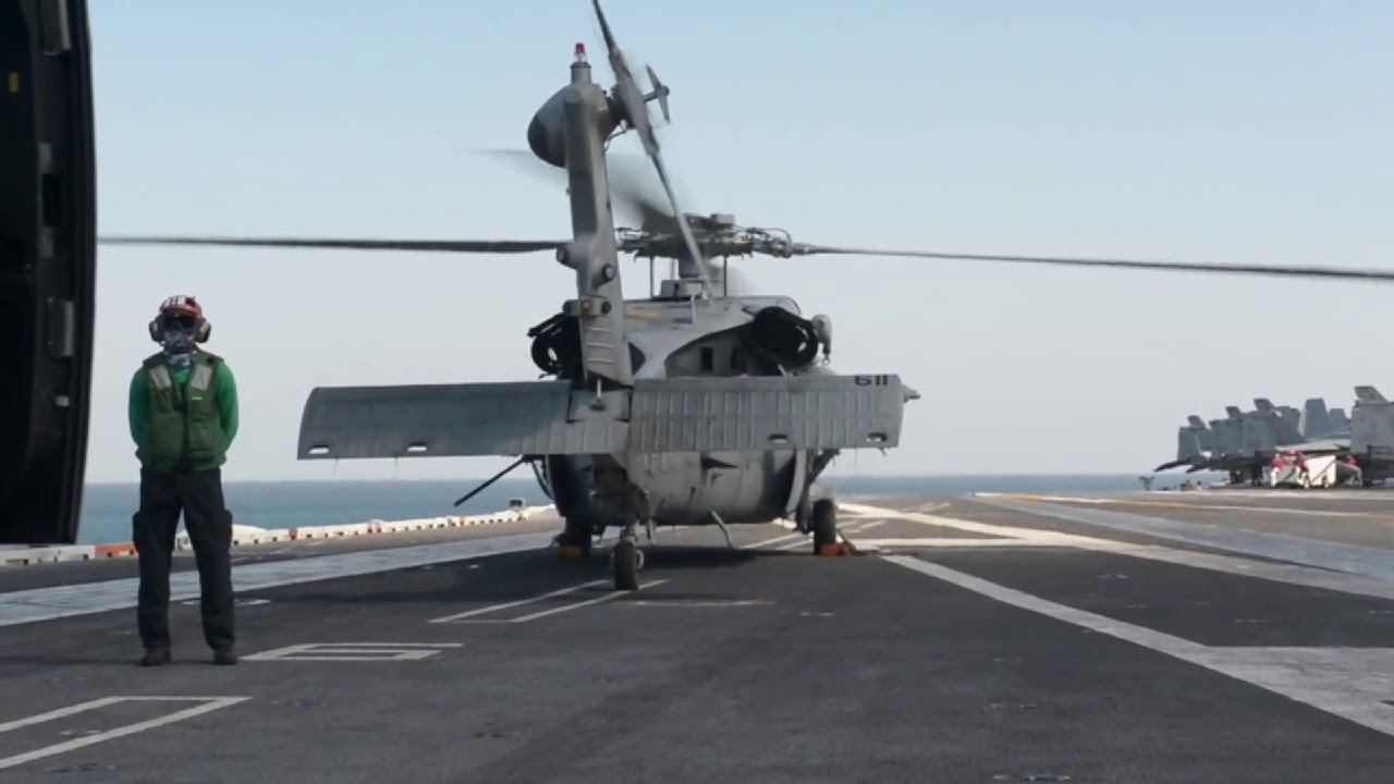 Helicopter Sea Combat Squadron conduct flight operations - YouTube