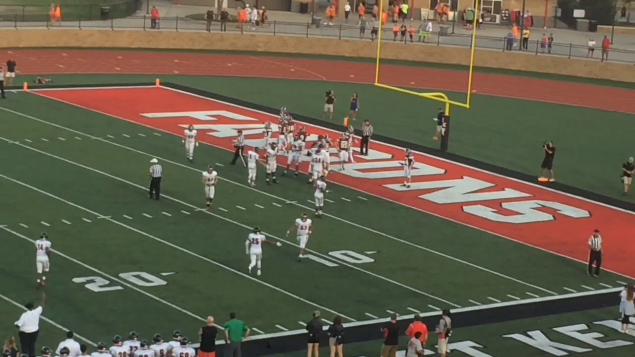 East Kentwood's Jayden Jones scores on a 2-yard run against Grandville ...