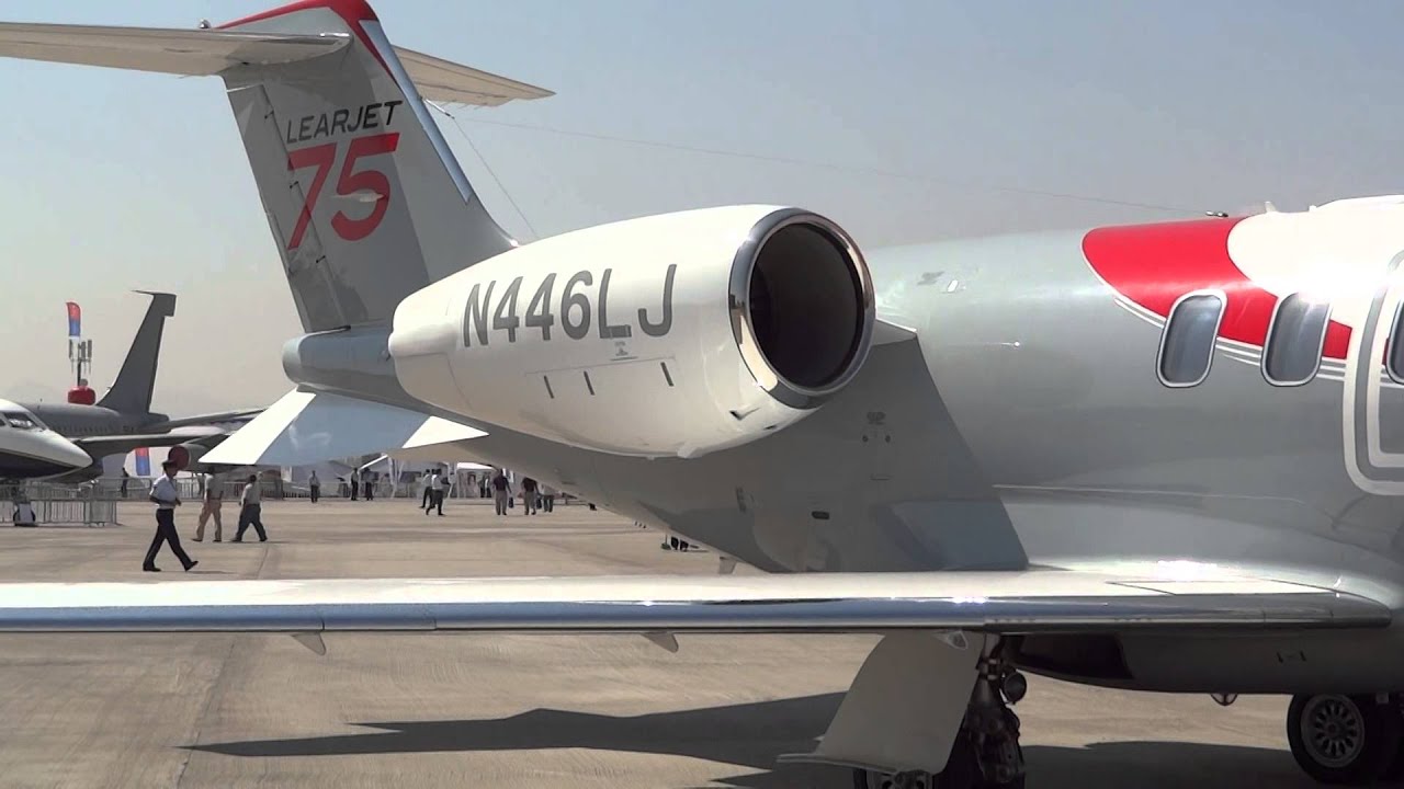 Learjet 75 N446LJ being towed at FIDAE 2014 - YouTube