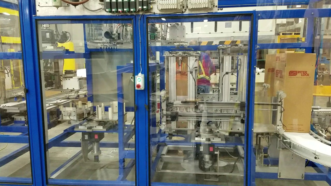 Handling and packaging metal roofing shingles - YouTube