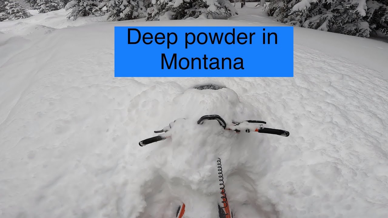 Carnage and deep powder! Snowmobiling Montana: how much snow is too ...