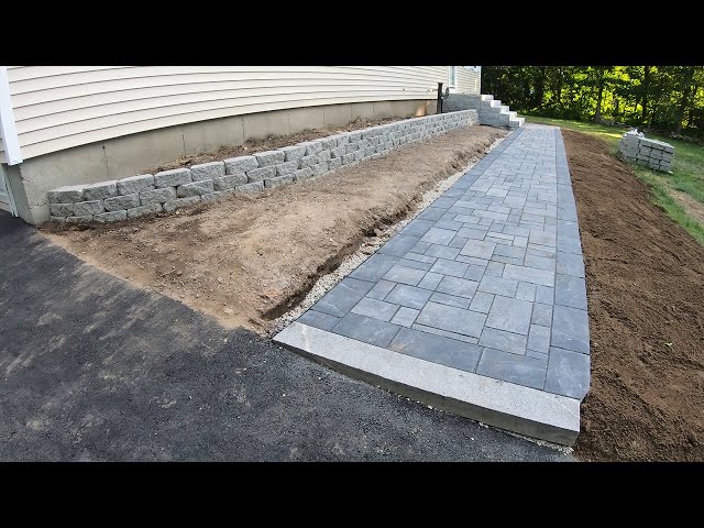 Concrete Sidewalk With Retaining Wall