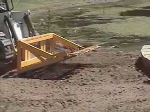 DIRT WORKS Skid Steer Bobcat Land Plane/Leveler - YouTube