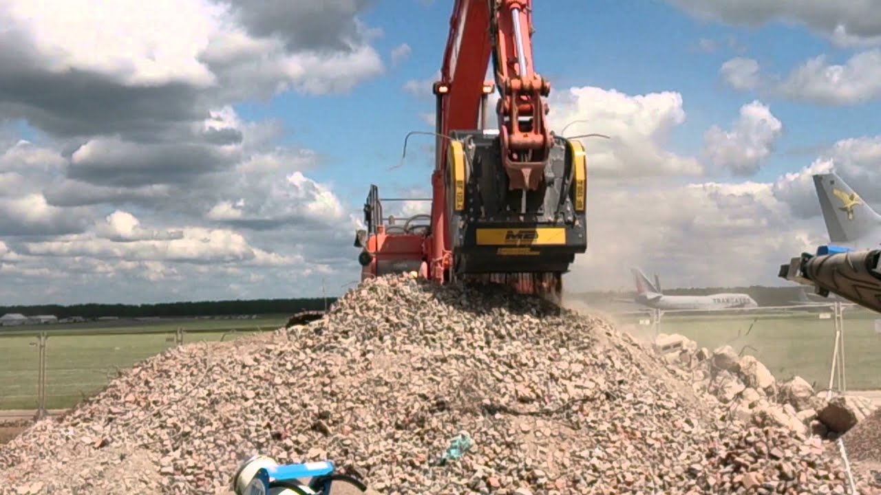 MB crusher bucket BF120.4 demonstrating in UK - YouTube
