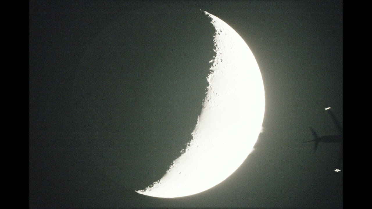 Jet passing in front of the Moon - YouTube