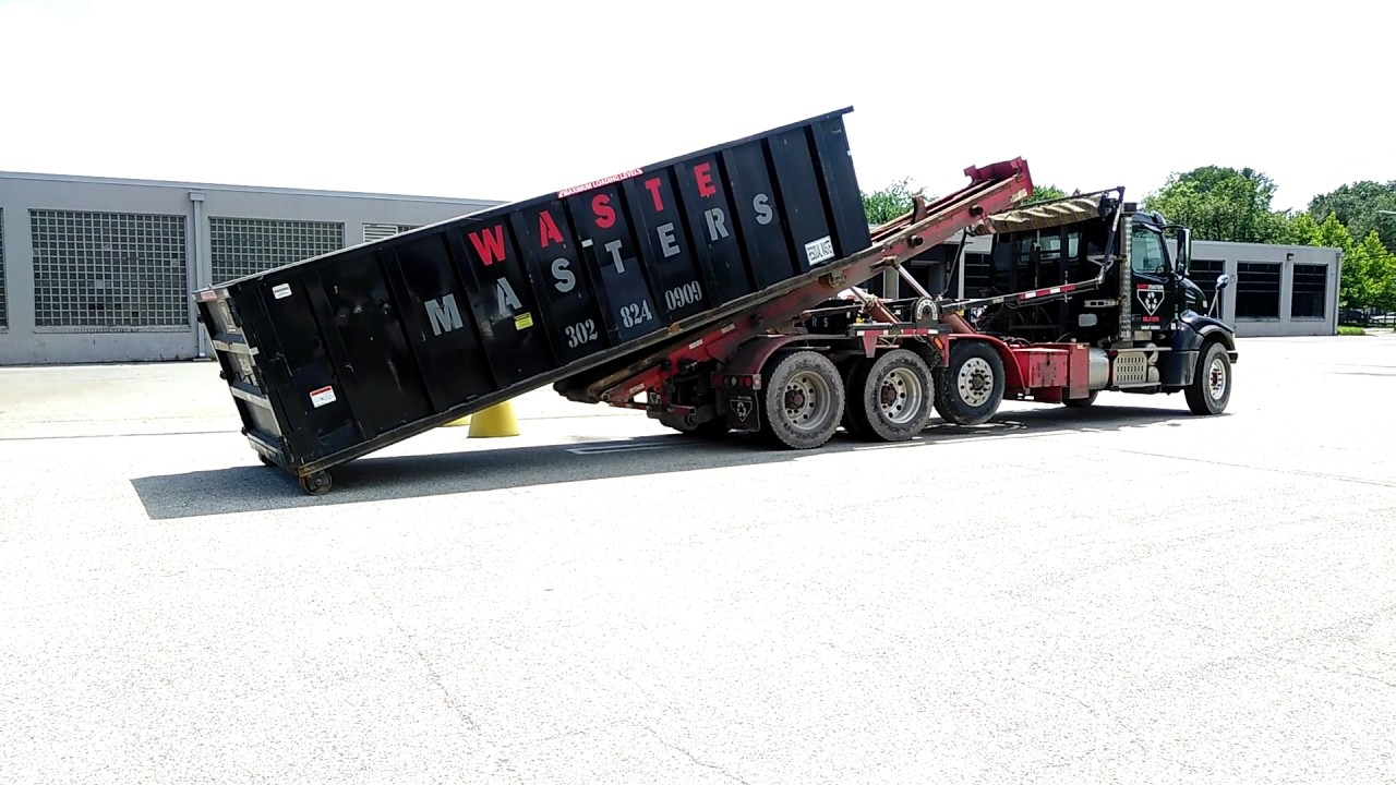 Waste Masters solutions roll off container truck - YouTube