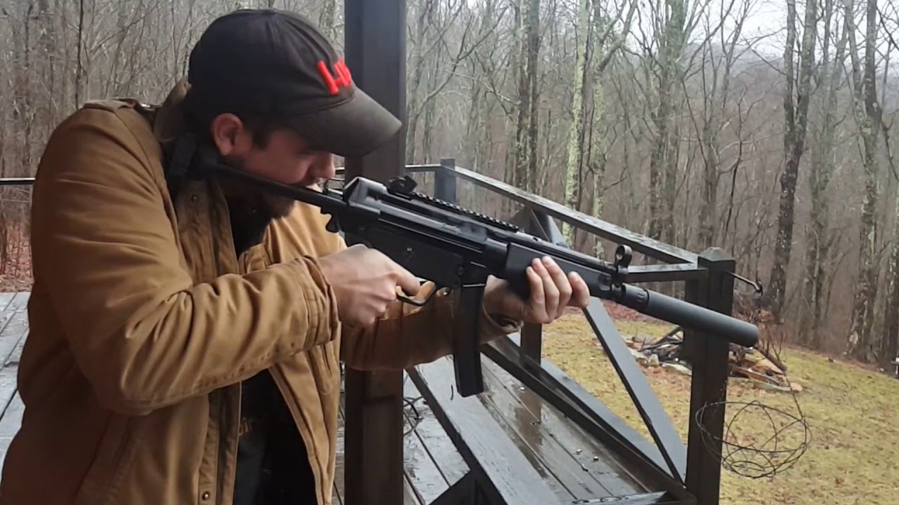 Omega MP5 Pistol with tailhook brace and SWR suppressor - YouTube
