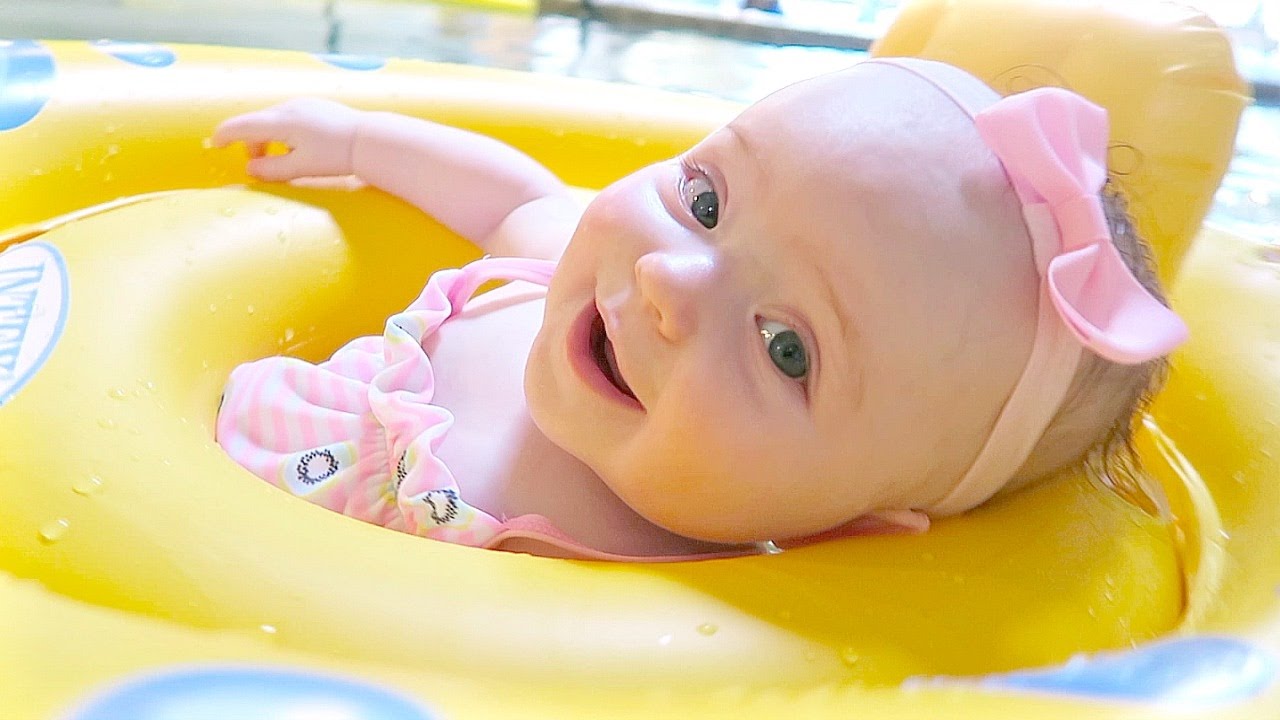 BABY'S FIRST TIME SWIMMING! - YouTube