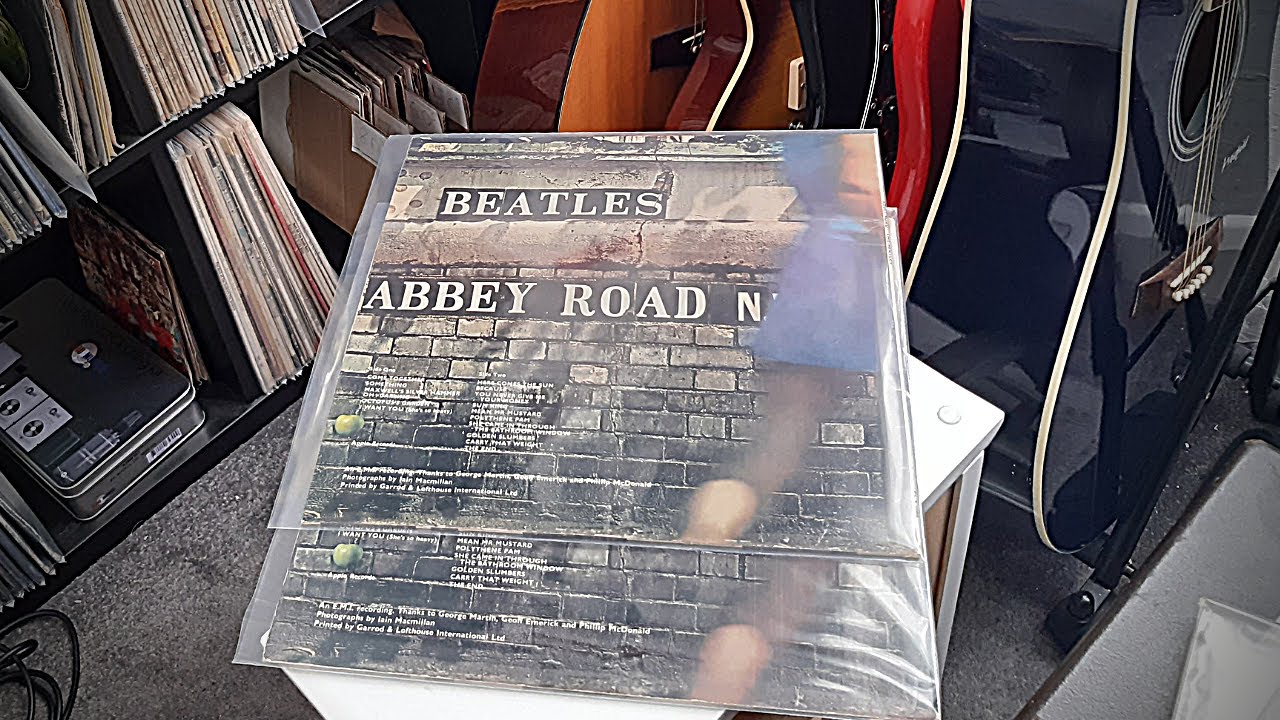 The Beatles Abbey Road Misaligned Apple Cover - YouTube