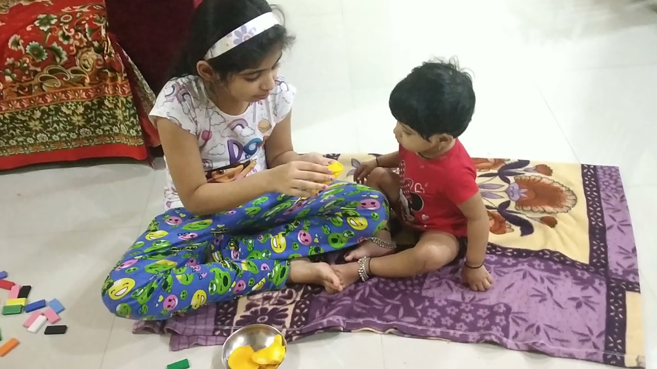 Sharing Mango with younger Sister - YouTube