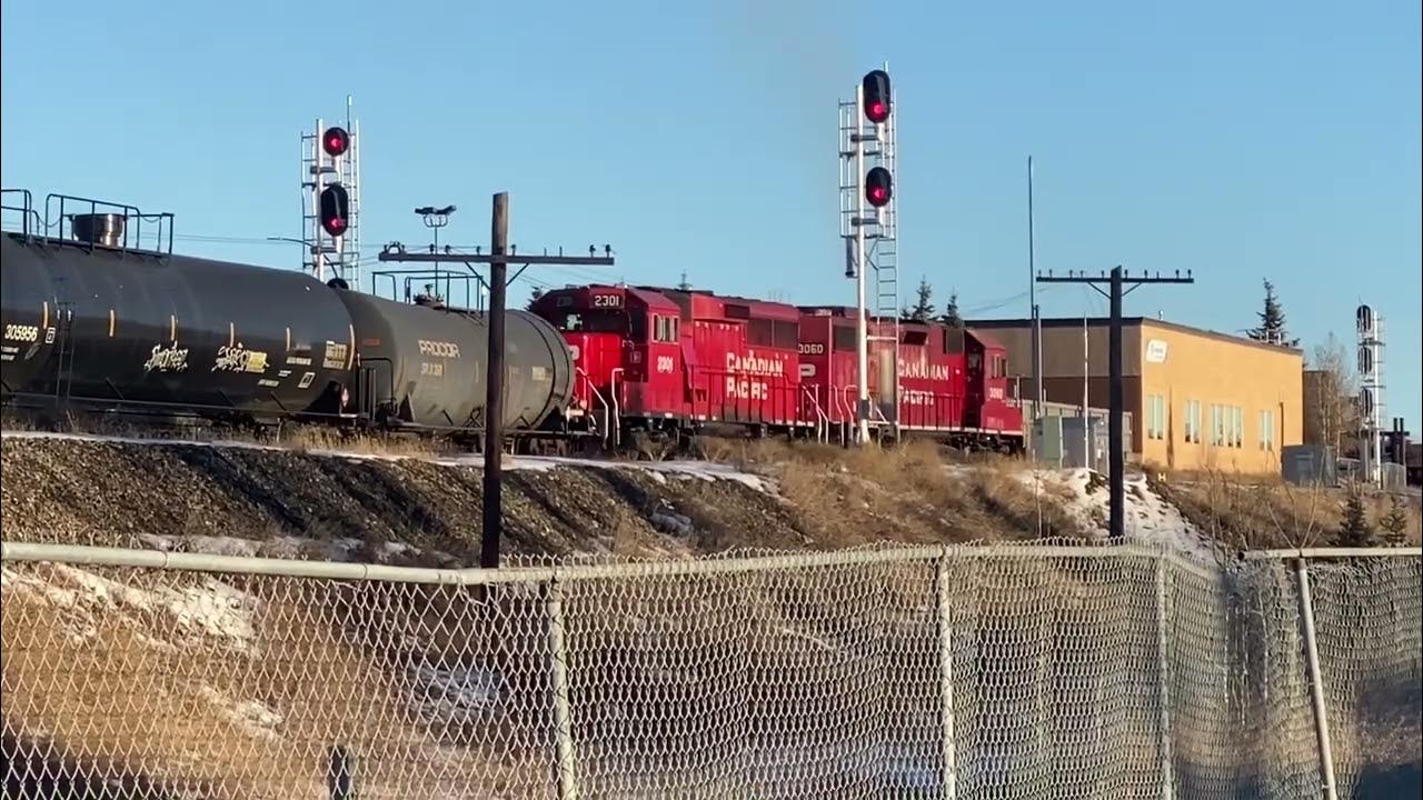 CPKC mixed freight train with CP 3060 and CP 2301 - YouTube