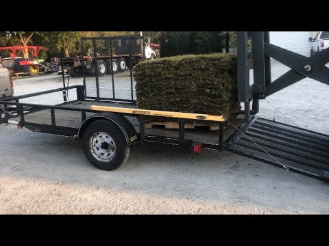 How to load sod on a single axle utility trailer - YouTube