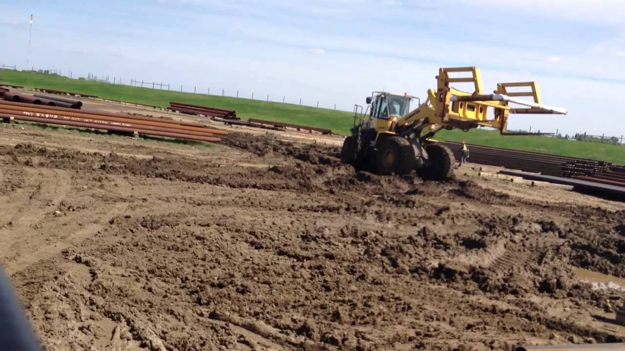 Pipe unloading - YouTube