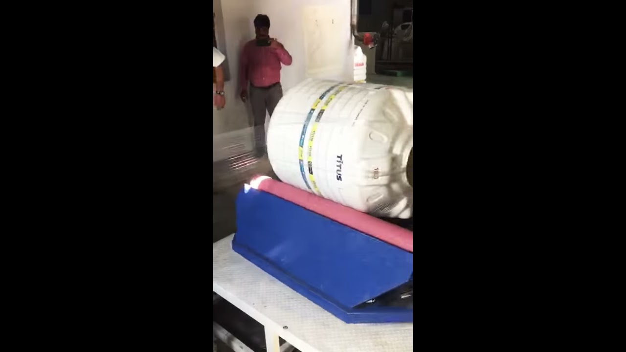 Tank wrapping machine - YouTube