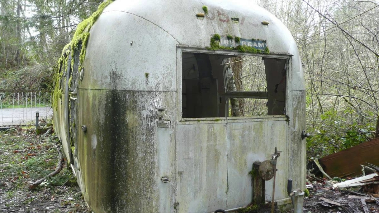 Old Airstream Travel Trailer Abandoned in Forest - YouTube