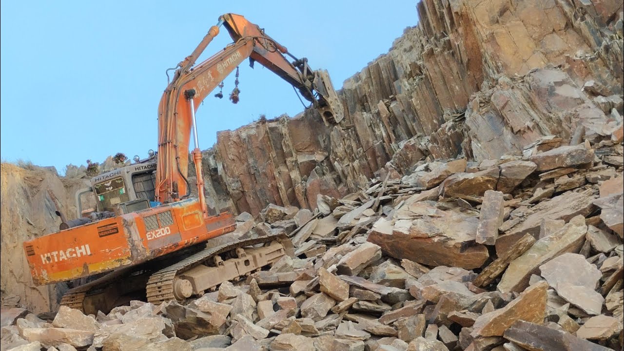 Mountain Rock Breaking: Mighty Hitachi EX200 Excavator Machine in ...