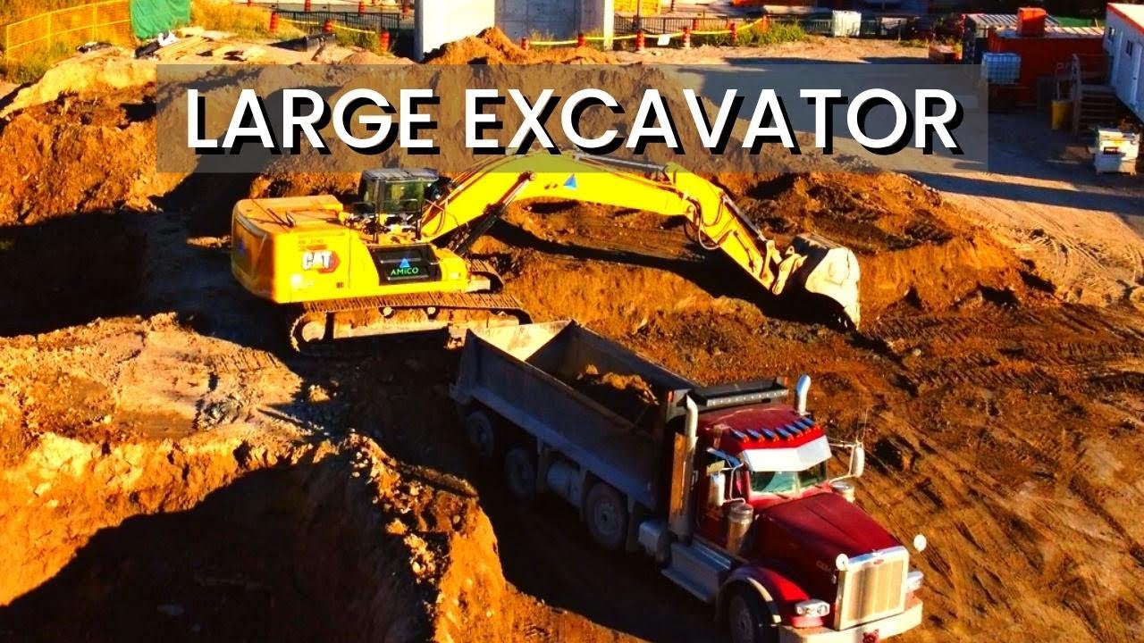 Excavator Loading Trucks: Caterpillar 336 Excavator Loading Peterbilt ...