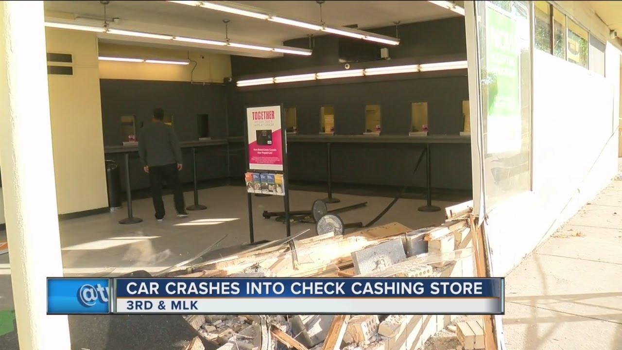 Car crashes into check-cashing store - YouTube