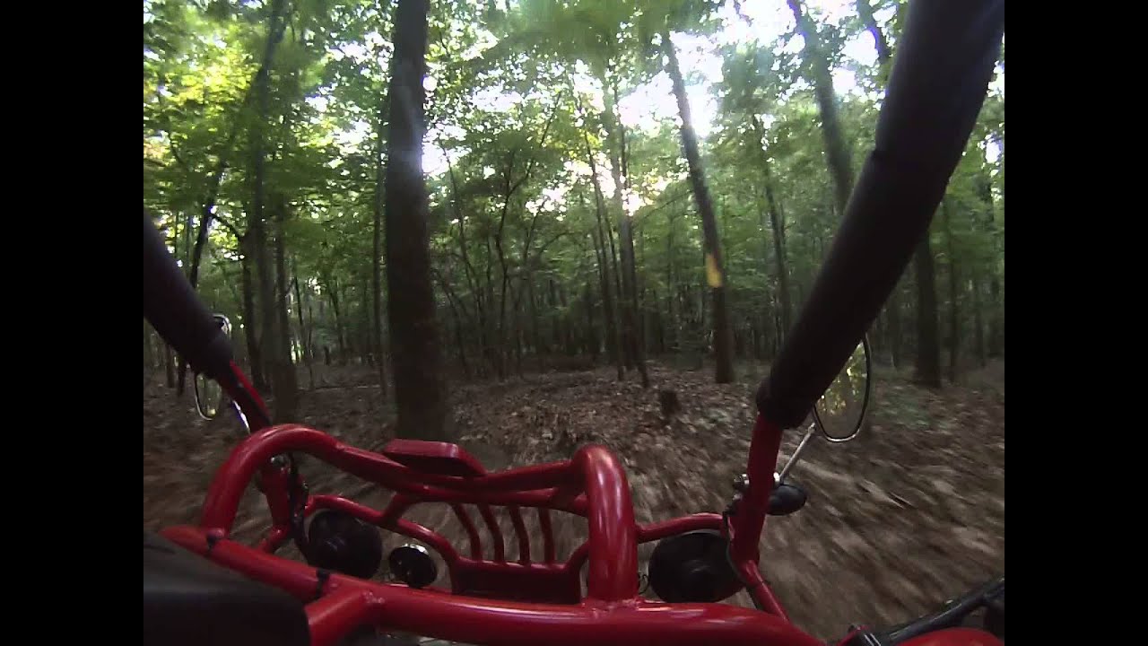 Trailmaster 150 XRX on my woods trail - YouTube