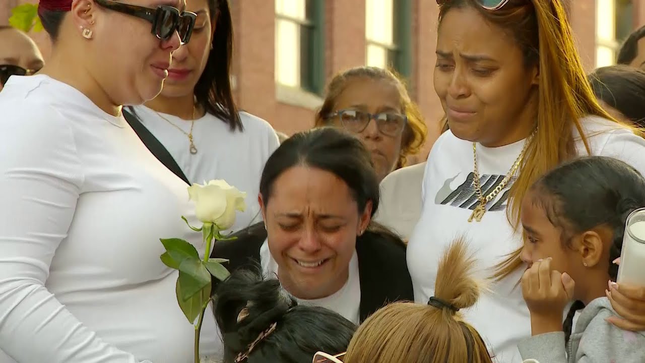 Murdered Lawrence mother remembered at emotional vigil - YouTube