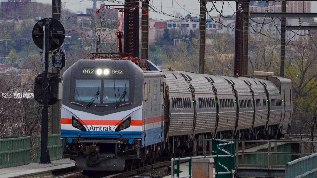 662 Leads Amtrak train 79 through Secaucus Junction Station on a cloudy day 4/16/22 - YouTube