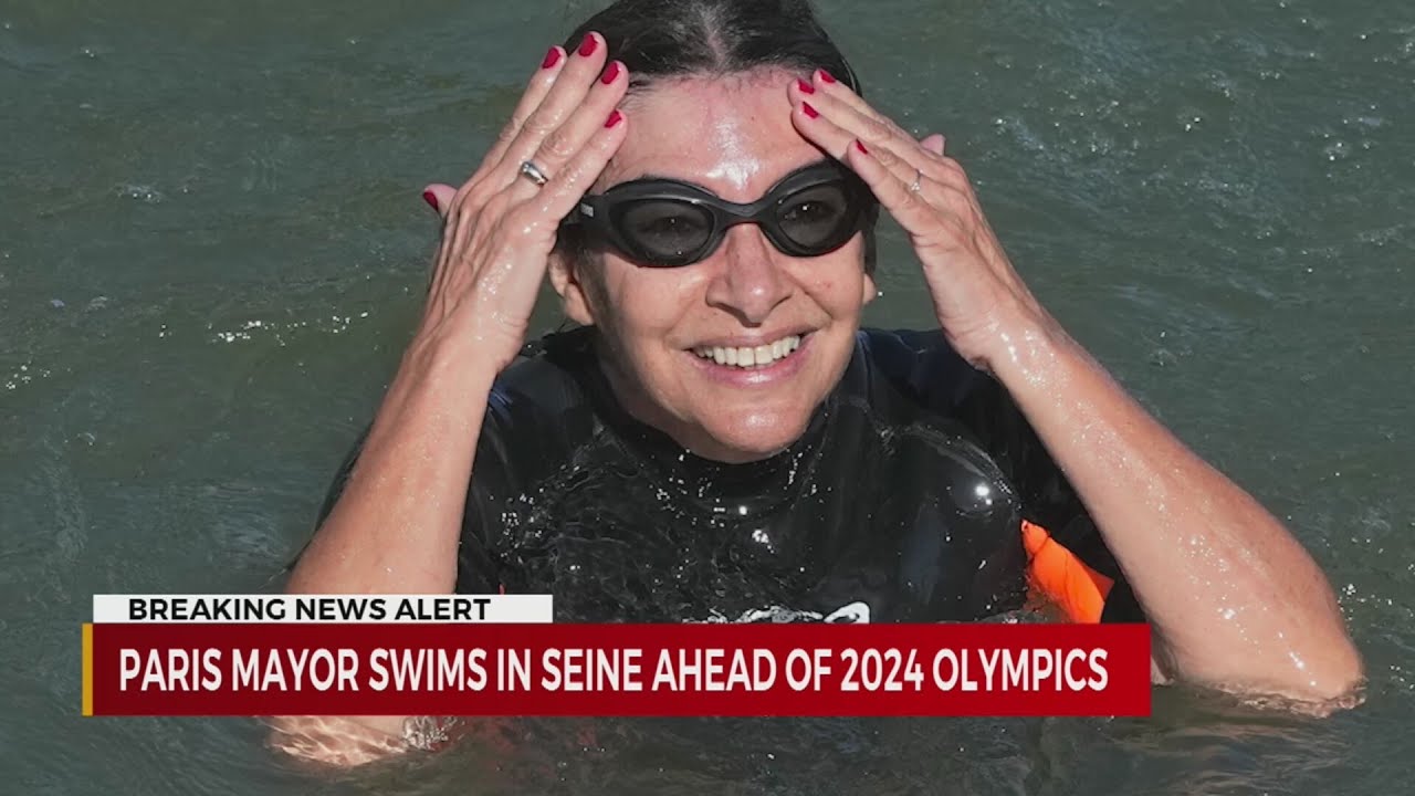 Paris mayor swims in Seine ahead of 2024 Olympics - YouTube
