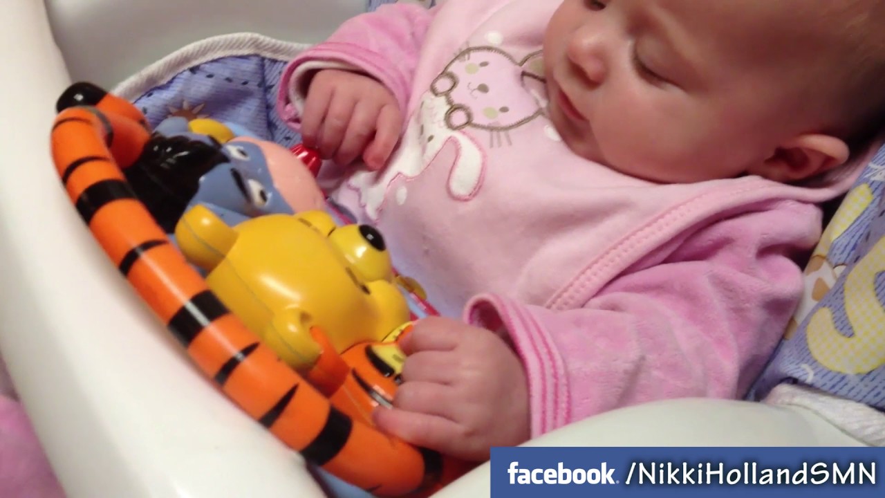 Miah playing with her Winnie the Pooh toy radio - YouTube