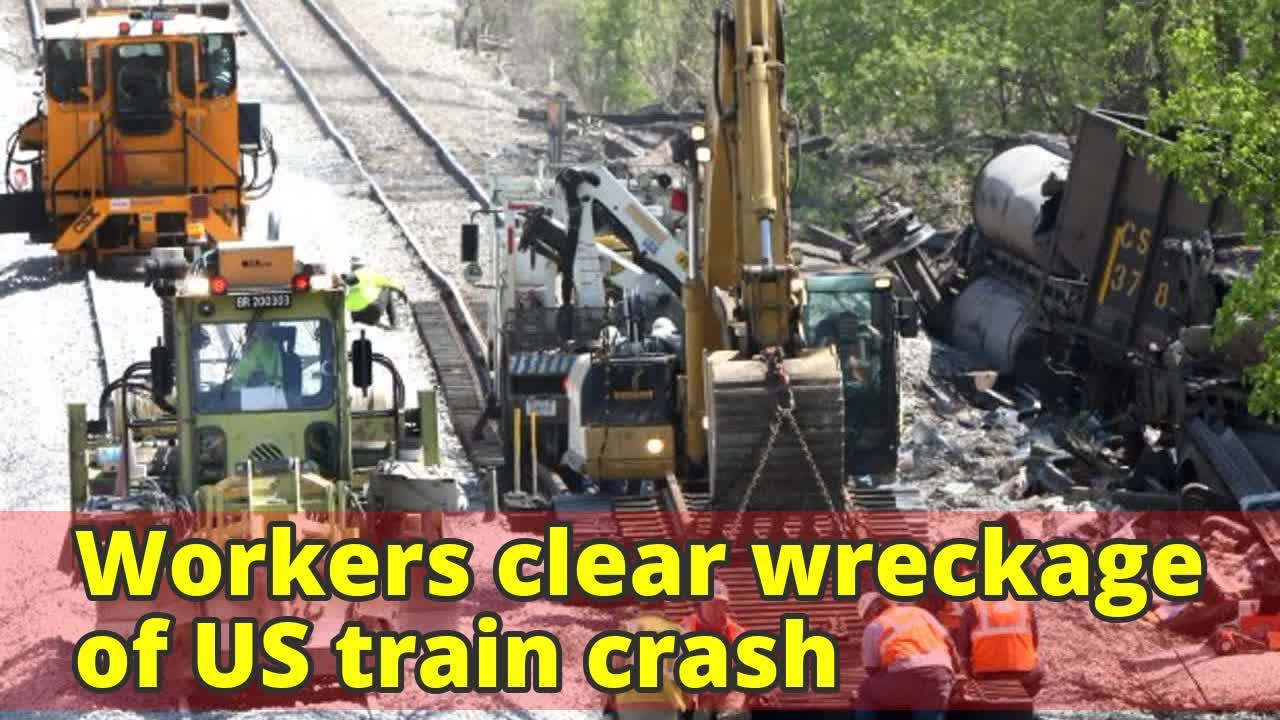Workers clear wreckage of US train crash - YouTube