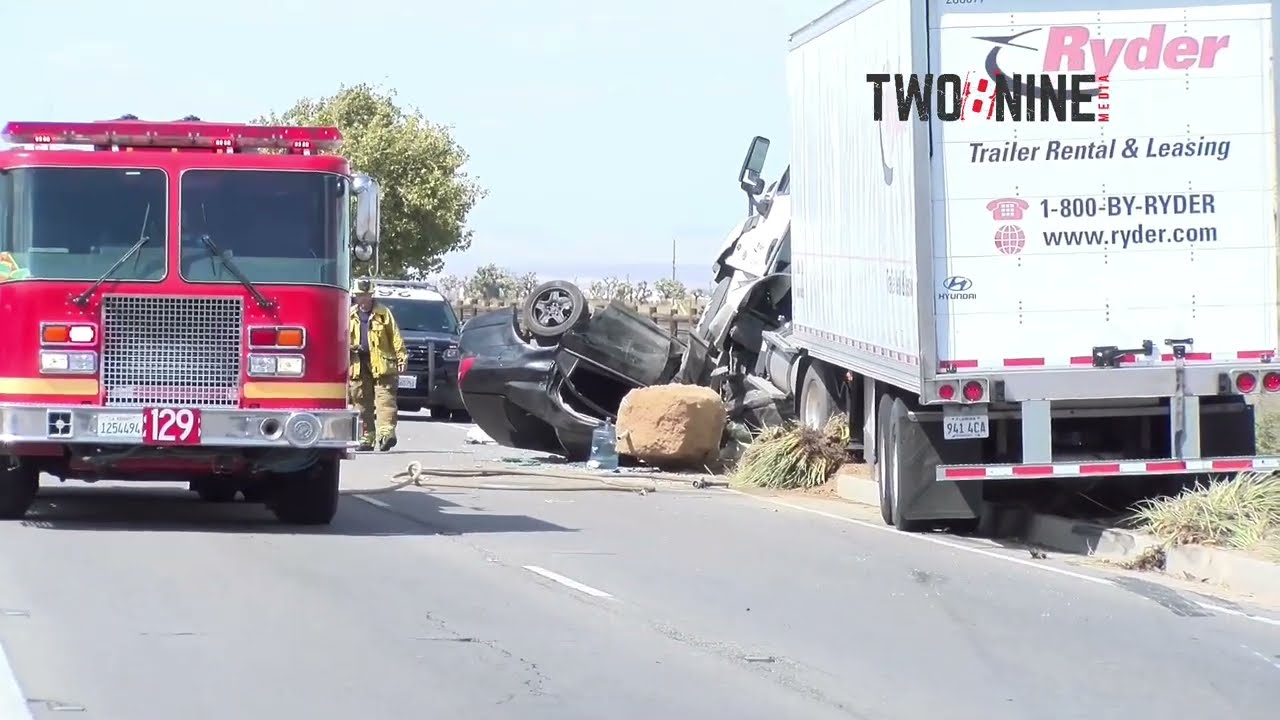 Violent traffic collision leaves car under semi truck, Palmdale CA ...