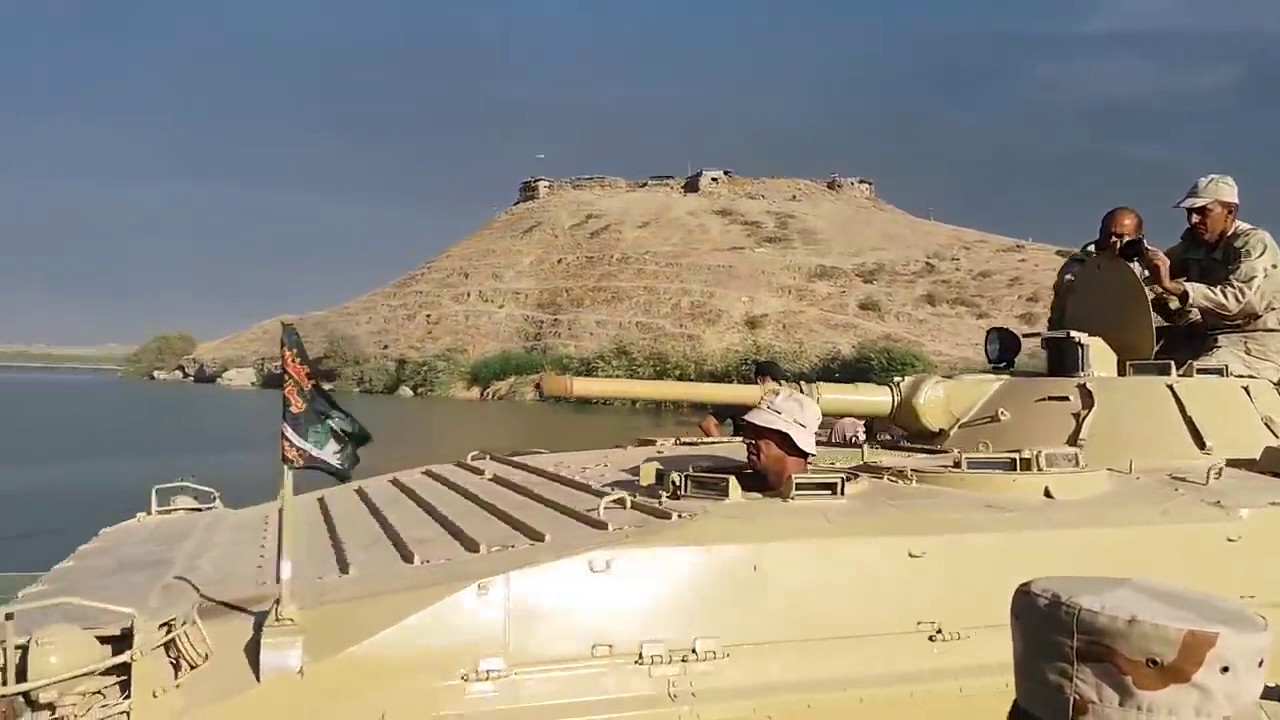 Mosul APC's of Iraq's 9th armoured division are passing Great Zab river ...