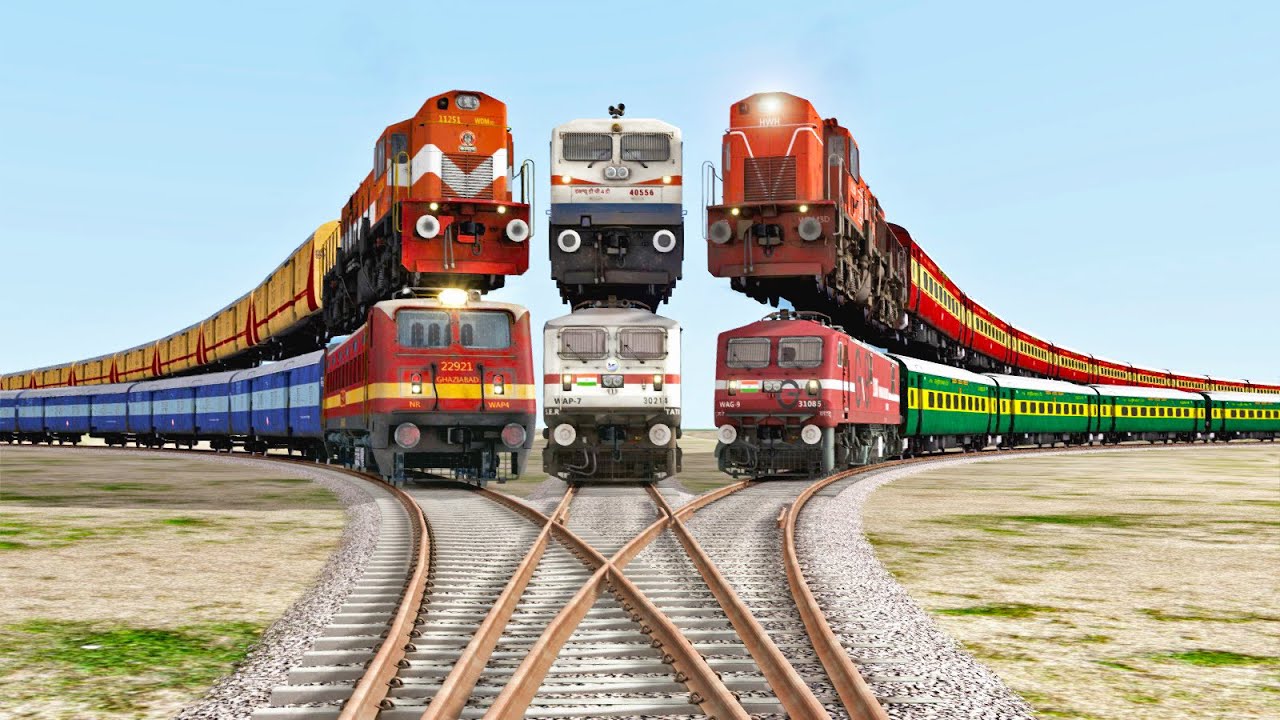 THREE TRAIN ON TOP OF THE TRAINS DIFFERENT STYLE CROSSING EACH OTHER ...
