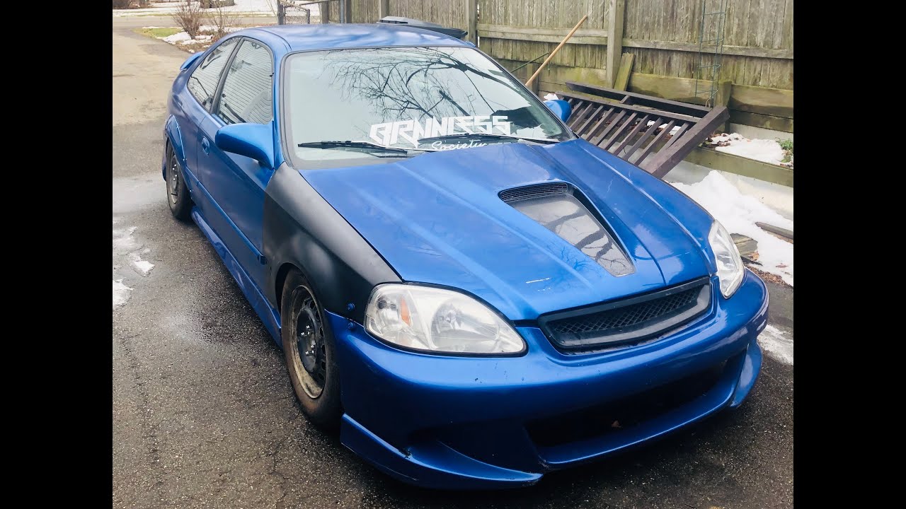 Finishing up the Honda core support and fitting the ricer hood and ...