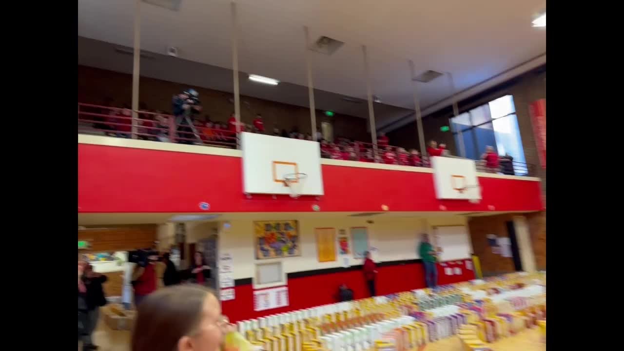 Red apple Elementary’s world record cereal domino fall attempt - YouTube
