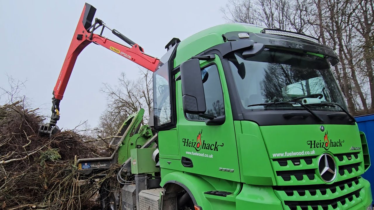 Mercedes -Benz 3353 Arocs Spezial mit Heizohack HM 14-860 KL Fuelwood ...