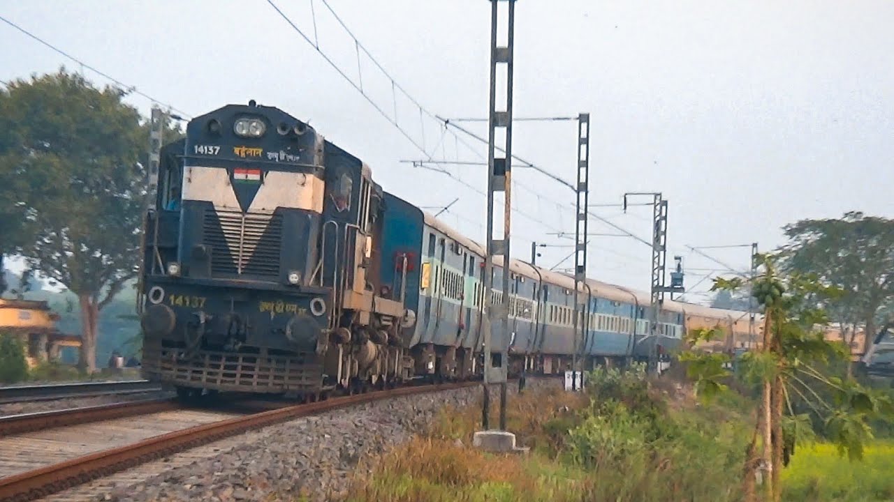 Aggressive speedy diesel express trains tilting on a huge curve - YouTube