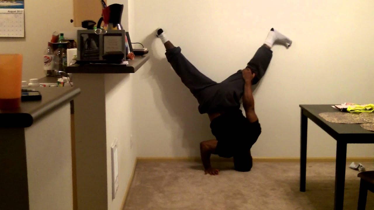 One arm handstand pushup attempts (halfway up) - YouTube