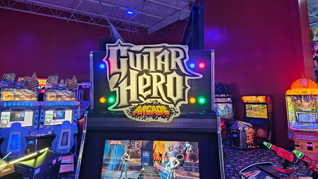 Playing Guitar Hero Arcade at the Fun Land - YouTube