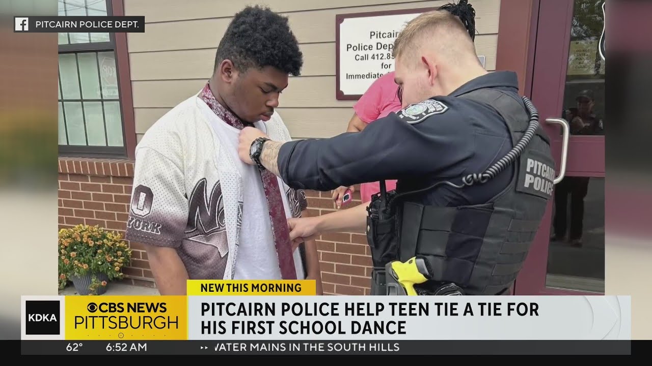 Pitcairn Police officers help teenager with his tie for his first ...