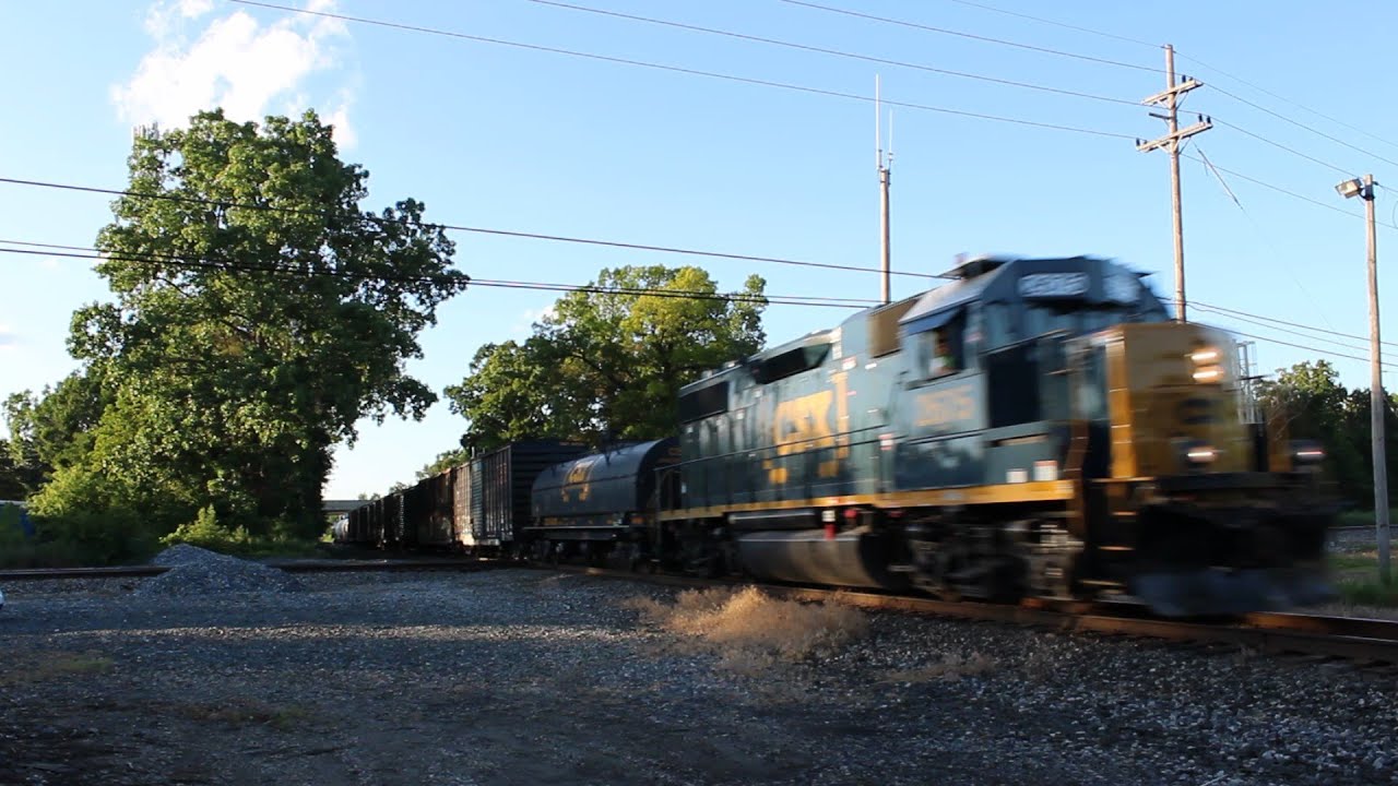 CSX 2675 GP38-2 sports her brand new YN3B coat as she hits the diamond w/ CSX Local D716 - YouTube