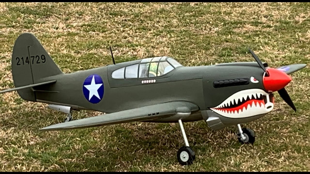 Phoenix Model P-40 Warhawk 35cc 80 inch wingspan Maiden day - YouTube