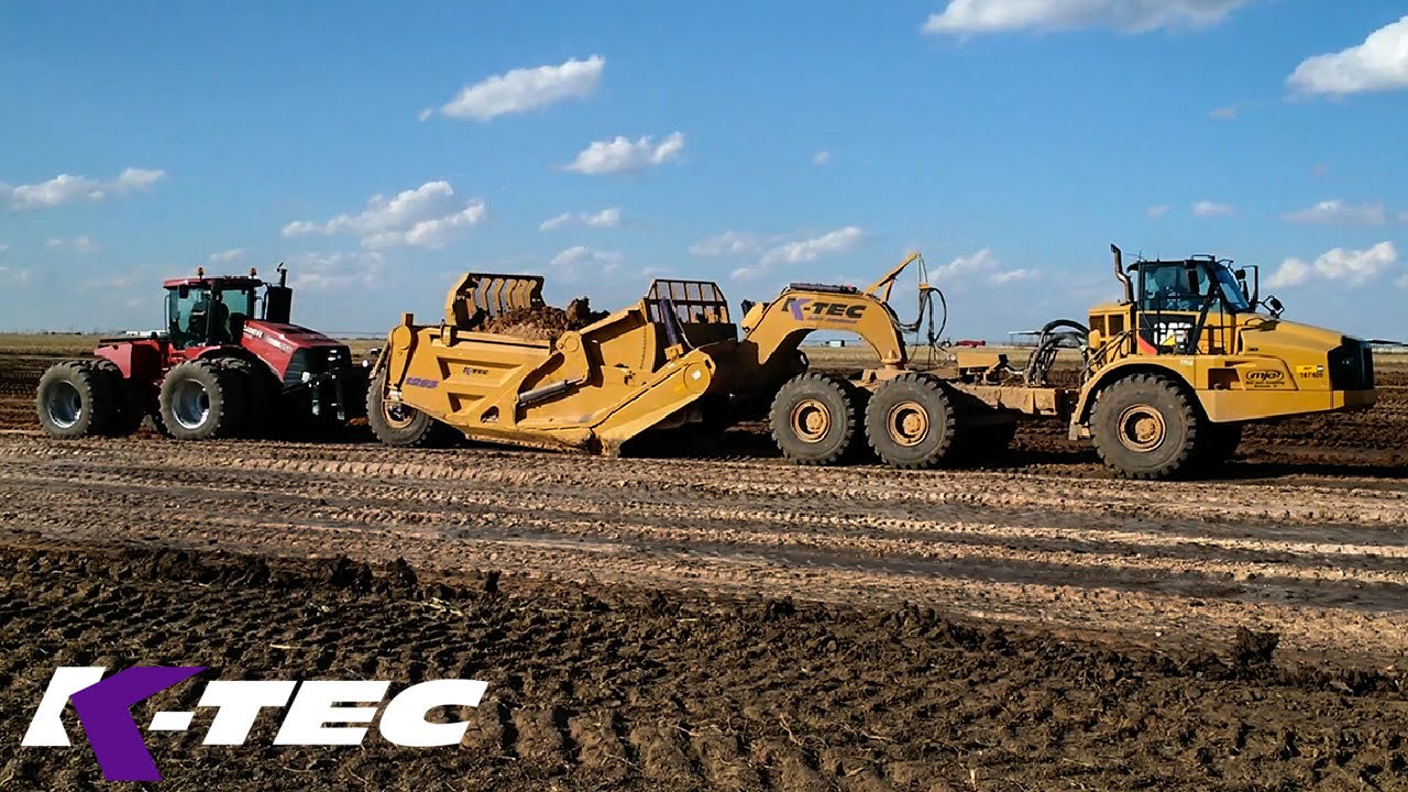 Case Tractor Pushing ADT to Load 63 Cubic Yard Scraper - YouTube