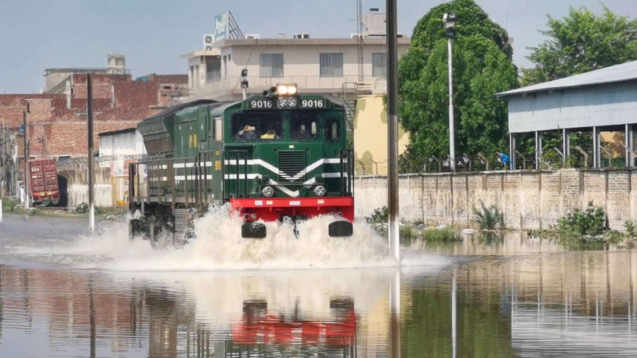 Train in Water | Tezgam Express & GE Locomotive Running Over Water In ...