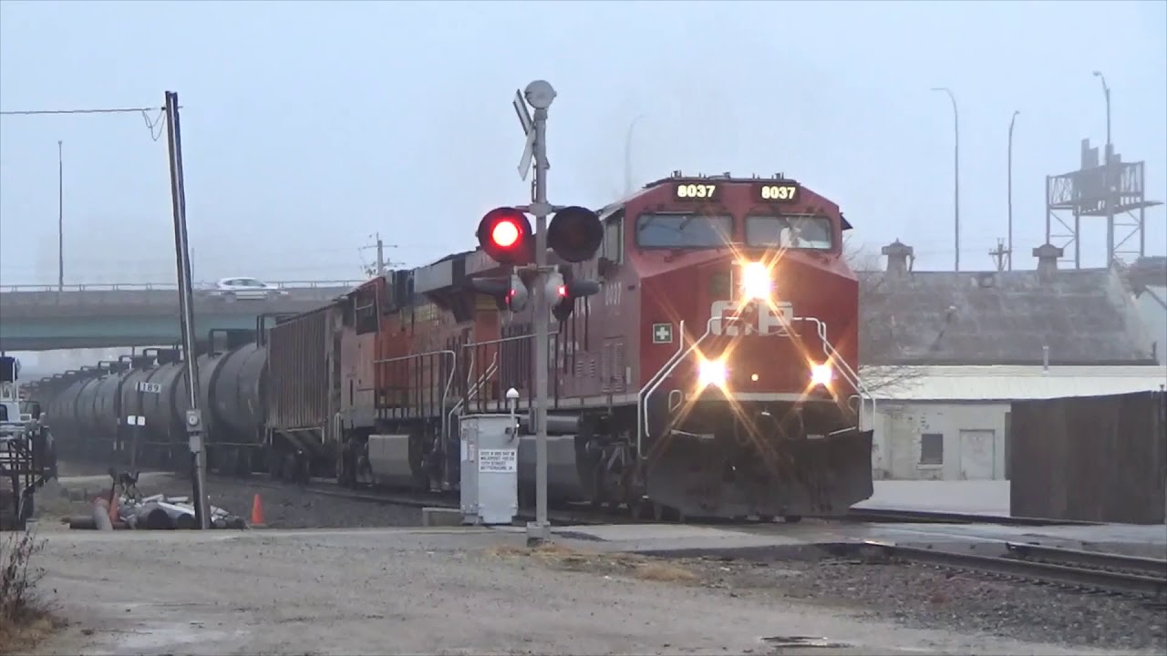 CP 575 meets 574 on a foggy afternoon at Bettendorf, IA December 28 ...