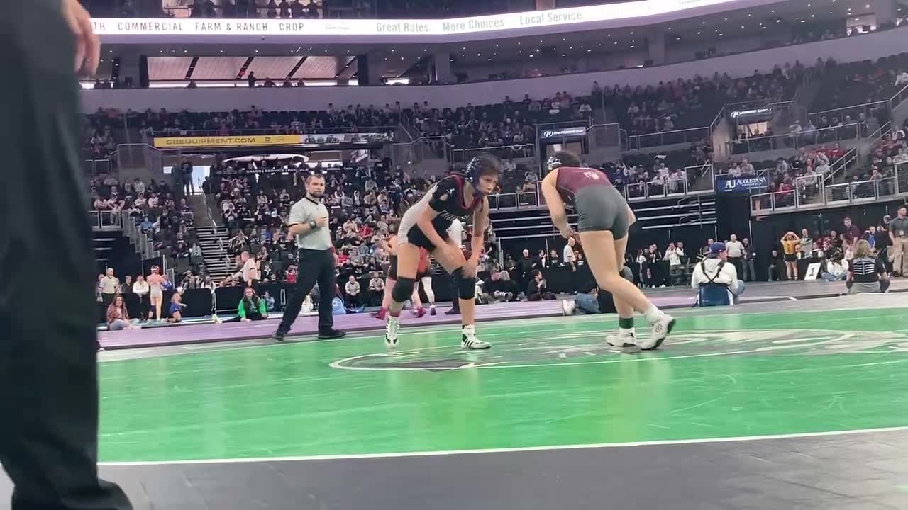 Spearfish's Mathilde Matsuda pins Lakota Tech's Jessica Waln during a ...